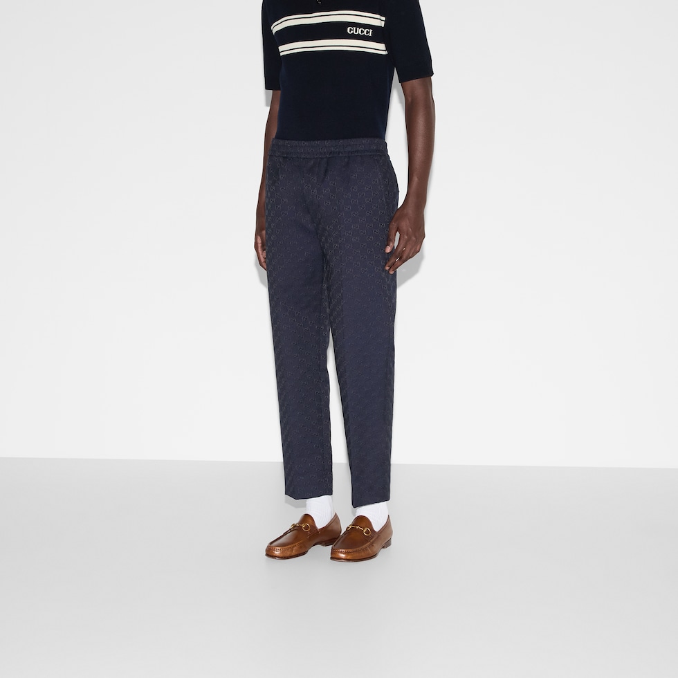 GG canvas track bottoms in dark blue | GUCCI® AU
