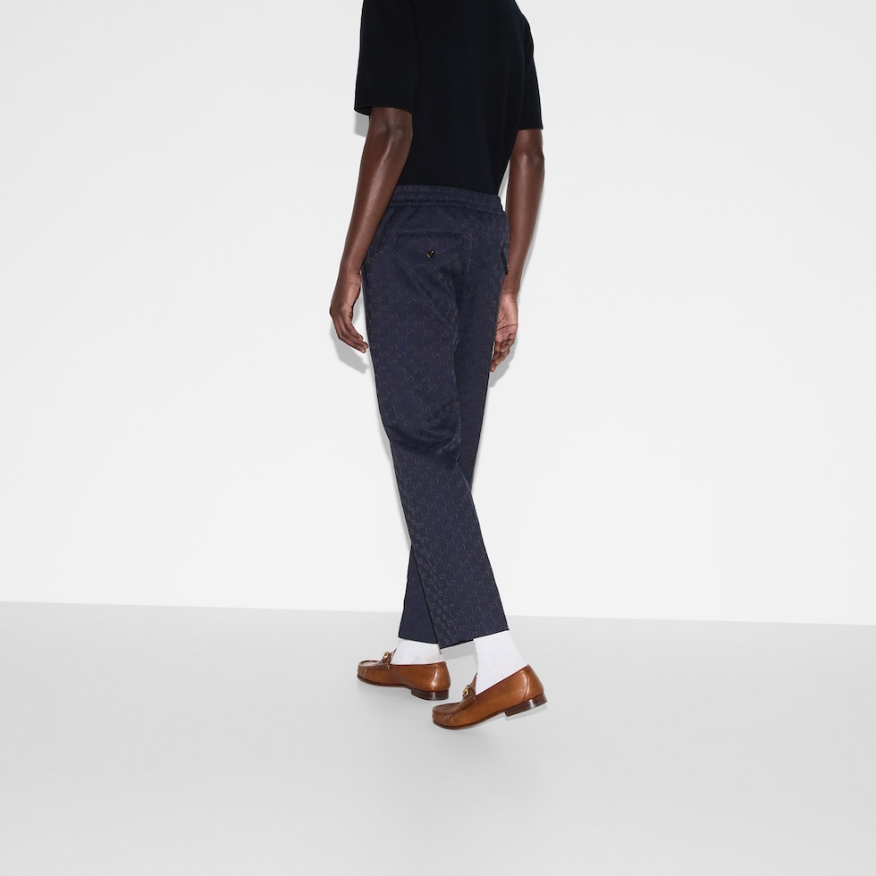 GG canvas track bottoms in dark blue | GUCCI® AU