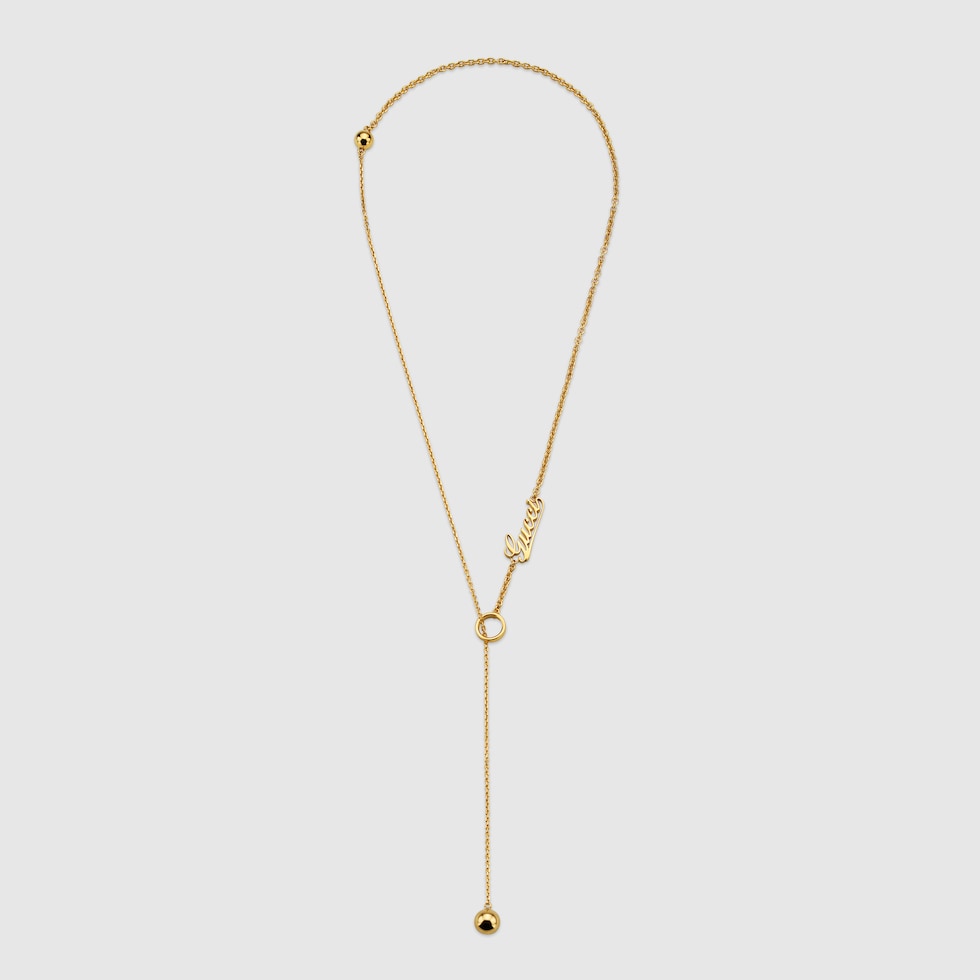 Drop chain necklace with Gucci script in yellow gold-toned metal ...