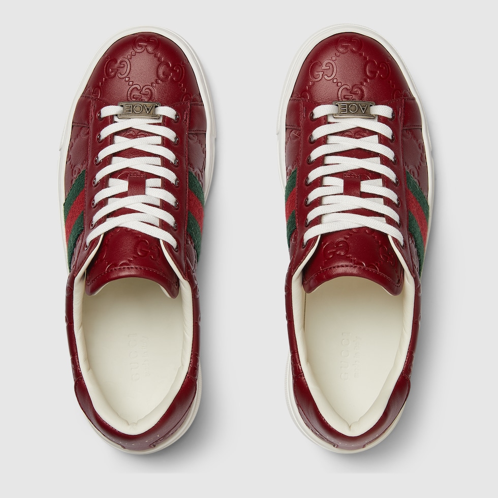 Women's Gucci Ace trainer with Web in Rosso Ancora GG leather | GUCCI® ZA