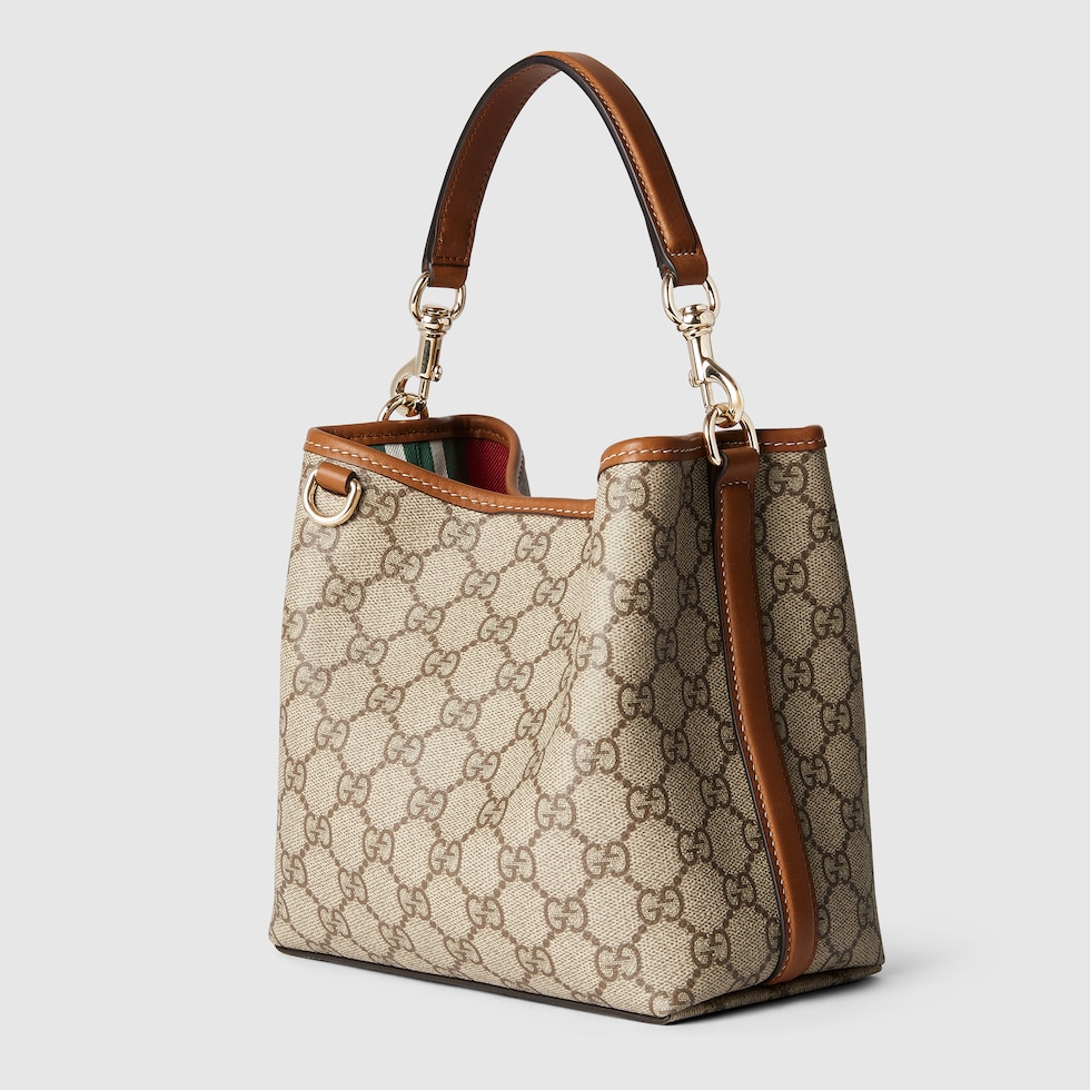 GG Emblem mini bucket bag in beige and dark brown canvas | GUCCI® IE
