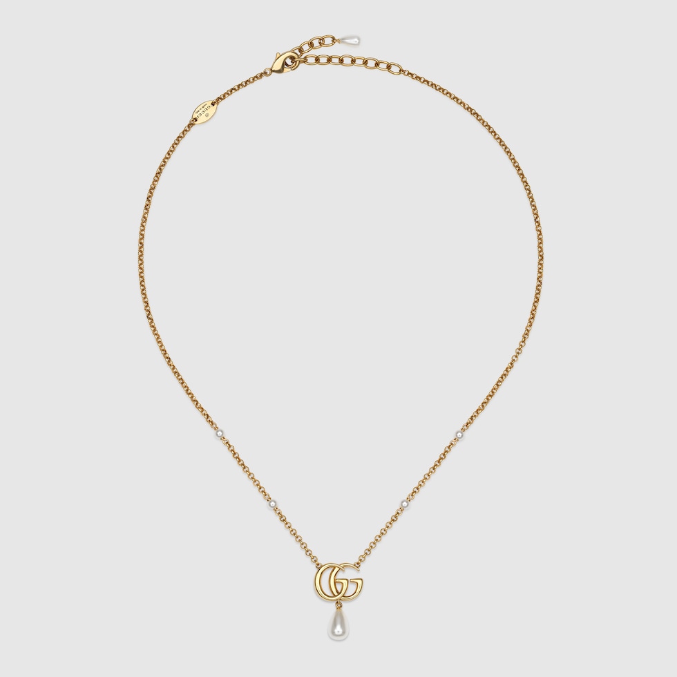 GG Marmont pendant necklace in yellow gold-toned metal | GUCCI® US