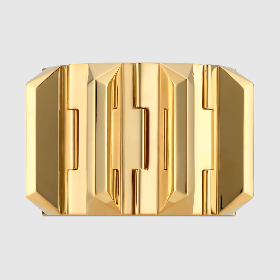 Cuff bracelet with geometric studs in yellow gold-toned metal | GUCCI® UK