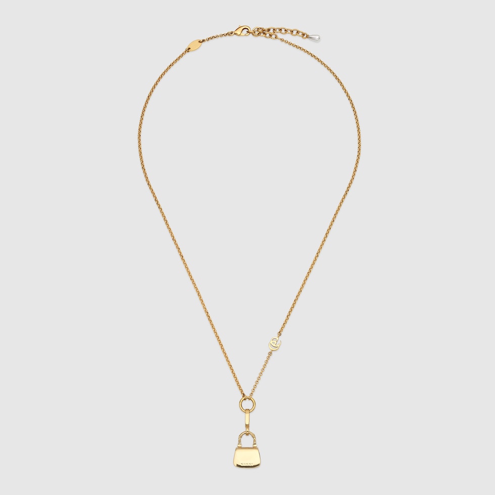 Chain necklace with bag pendant in yellow gold-toned metal | GUCCI® US
