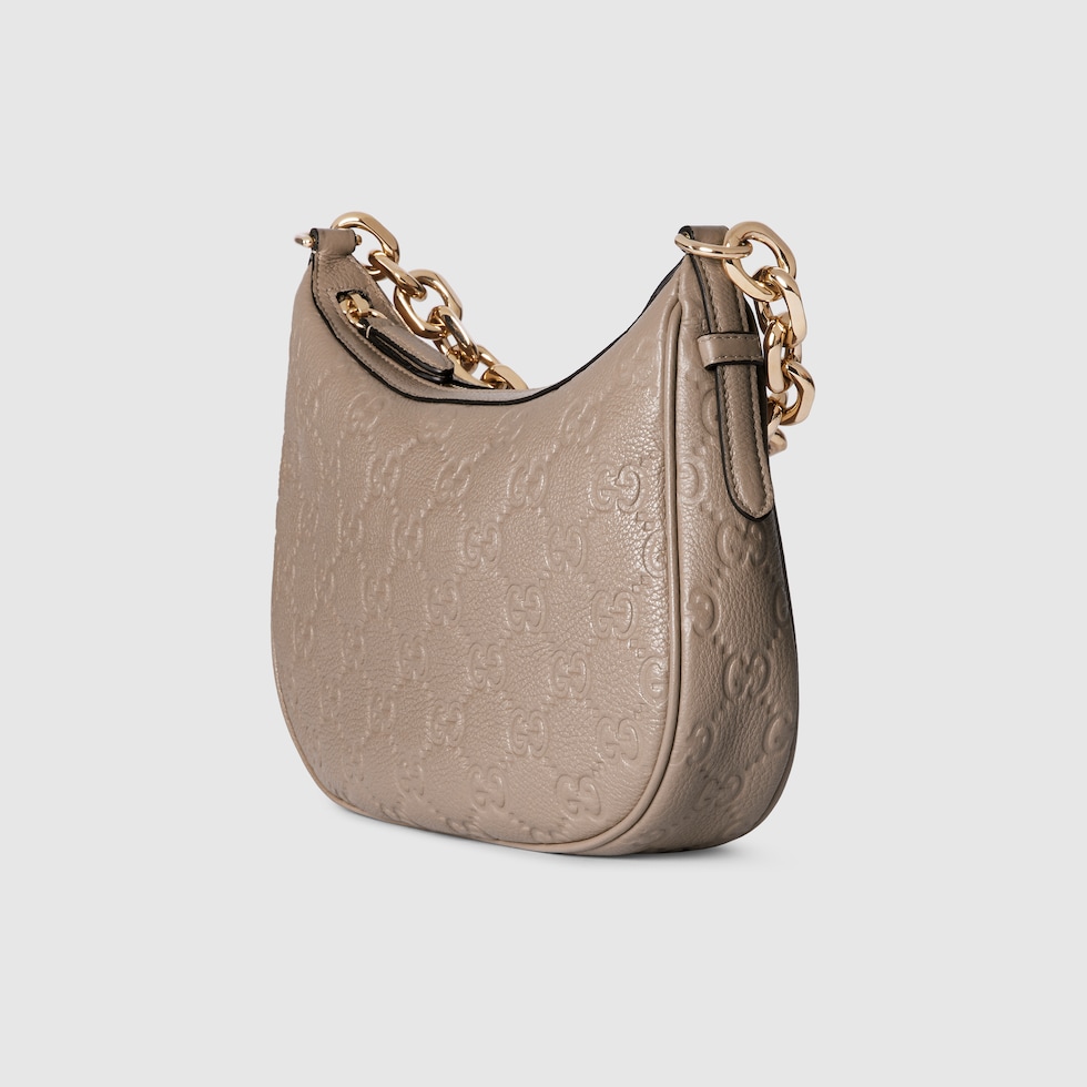 GG Emblem medium shoulder bag in taupe GG leather | GUCCI® Canada
