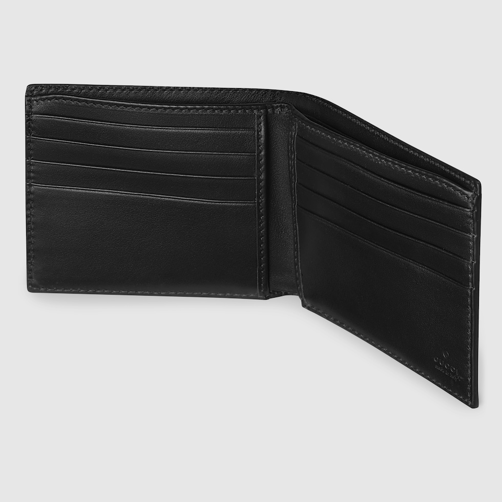 Bi-fold embossed wallet in black leather | GUCCI® HU