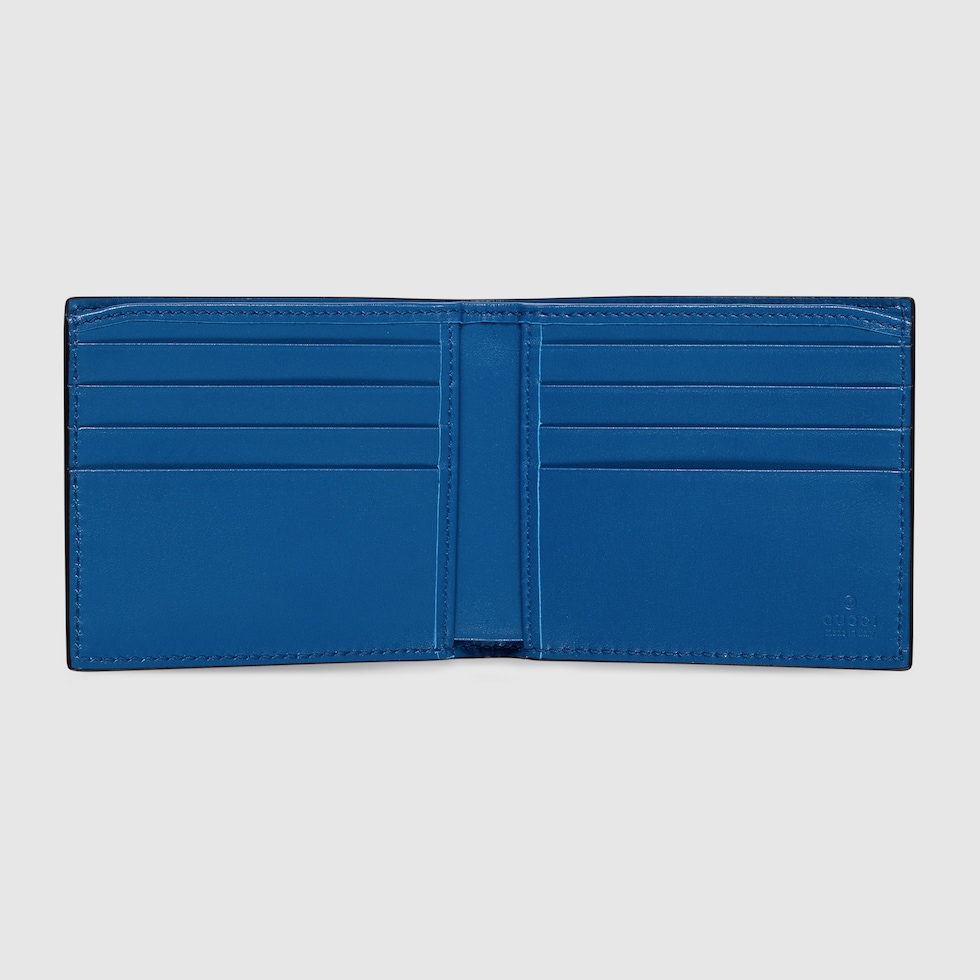 Bi-fold embossed wallet in bright blue leather | GUCCI® PL