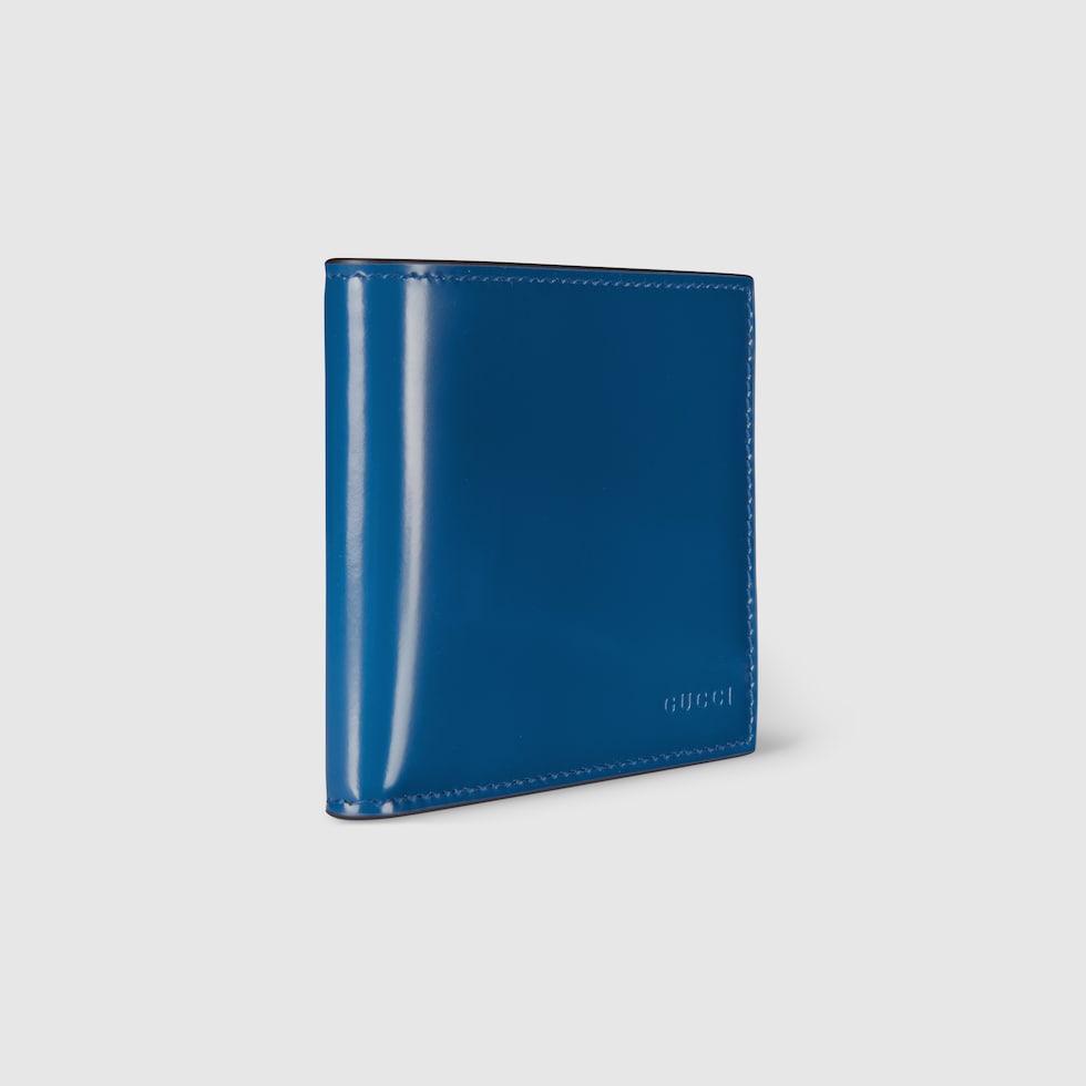Bi-fold embossed wallet in bright blue leather | GUCCI® RO