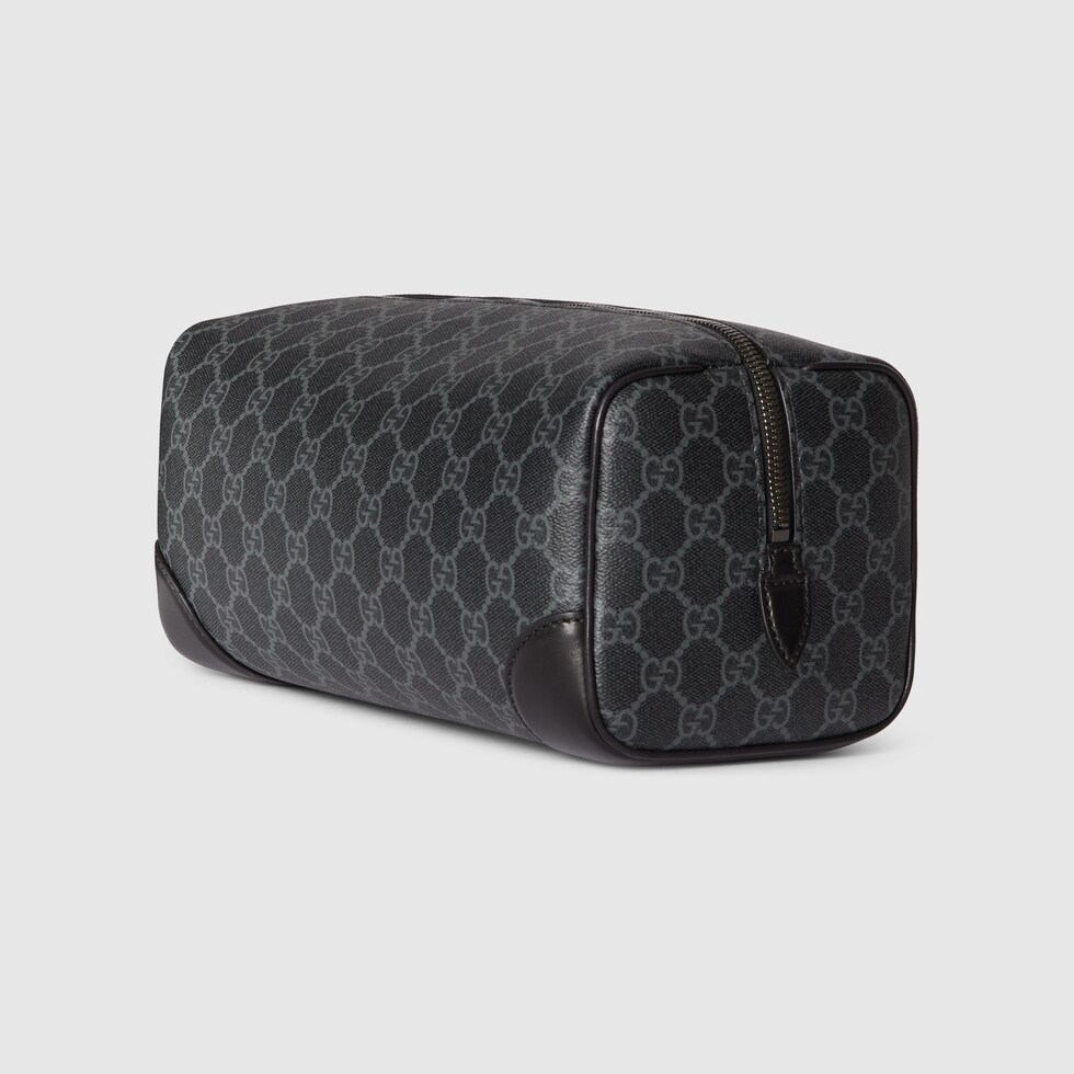 GG Emblem medium toiletry case in black fabric | GUCCI® Australia
