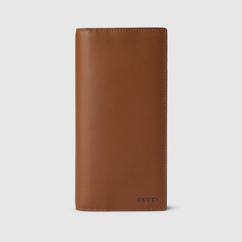 GG Emblem long embossed wallet in brown leather | GUCCI® UK
