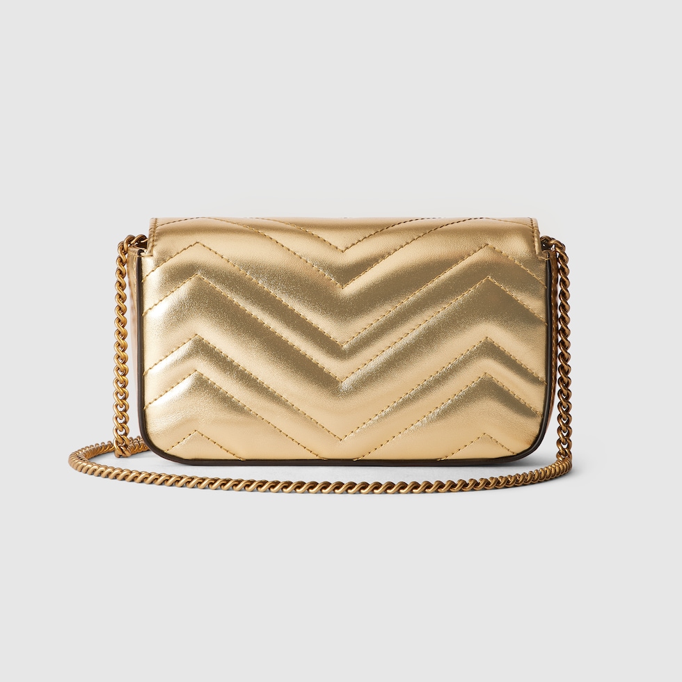 GG Marmont mini bag in gold leather | GUCCI® FR