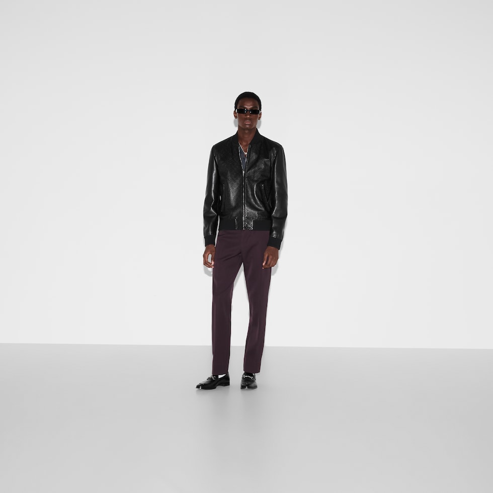Embossed GG leather bomber jacket in black | GUCCI® SG