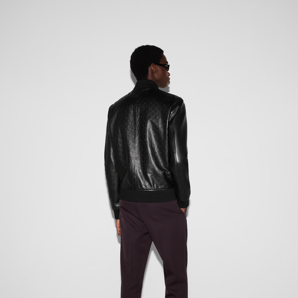 Embossed GG leather bomber jacket in black | GUCCI® SG
