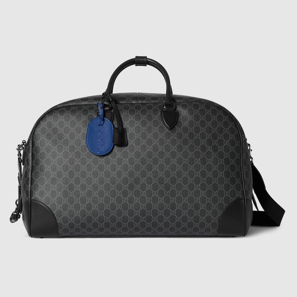 GG Emblem large duffle bag in black fabric | GUCCI® CA