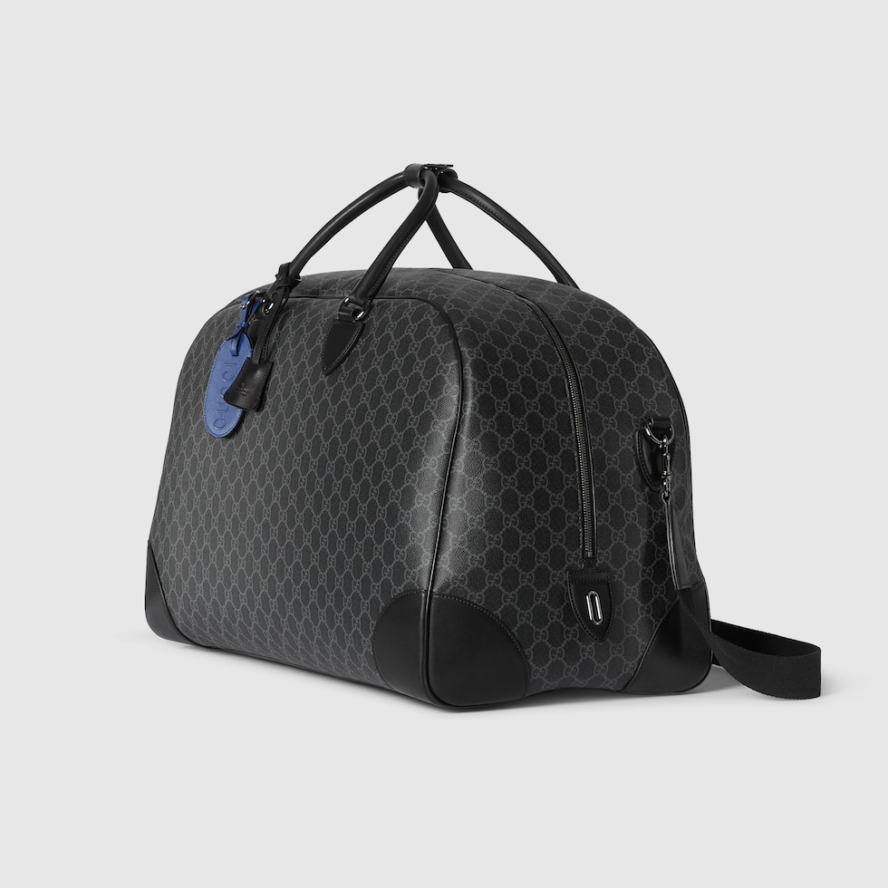GG Emblem large duffle bag in black fabric | GUCCI® NL