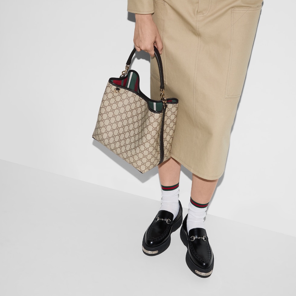 GG Emblem medium bucket bag in beige and brown GG fabric | GUCCI® US