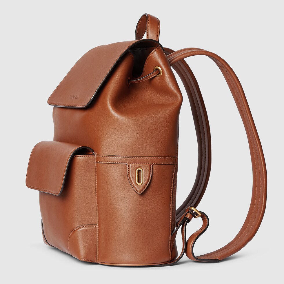 GG Emblem medium backpack in brown leather | GUCCI® CZ