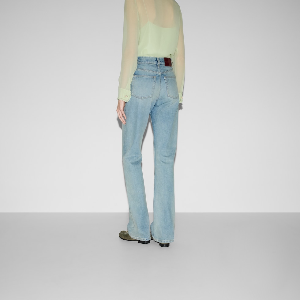 High rise boot cut denim pants in blue | GUCCI® UK