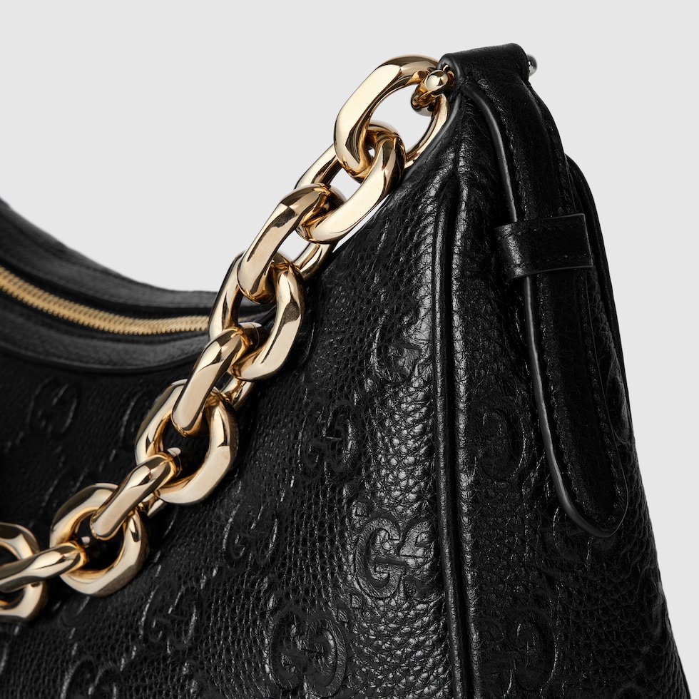 GG Emblem medium shoulder bag in black leather | GUCCI® MX