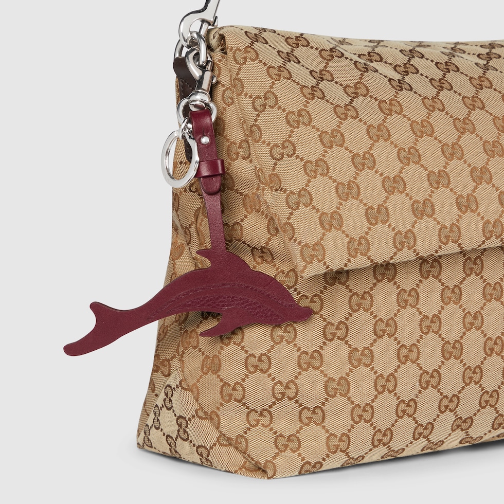 Dolphin keychain charm in rosso ancora red leather | GUCCI® SE