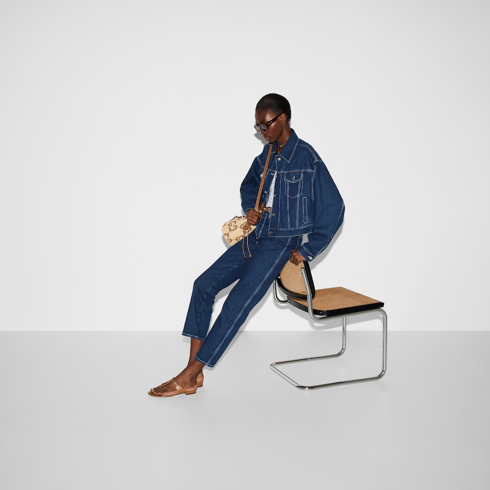 Slim cropped fit lasered denim pants in blue | GUCCI® US