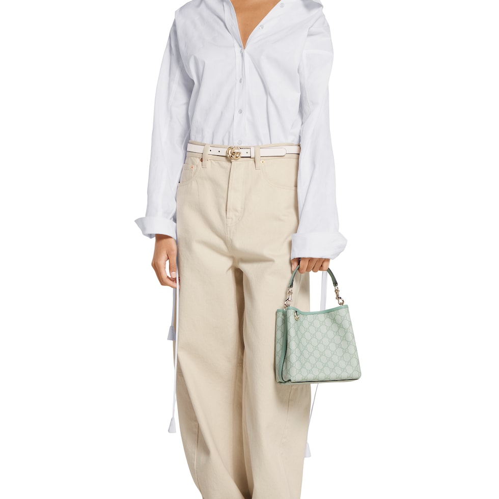 GG Emblem mini bucket bag in sage green fabric | GUCCI® SE