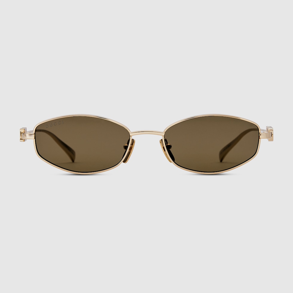 Oval frame sunglasses in gold-toned | GUCCI® US