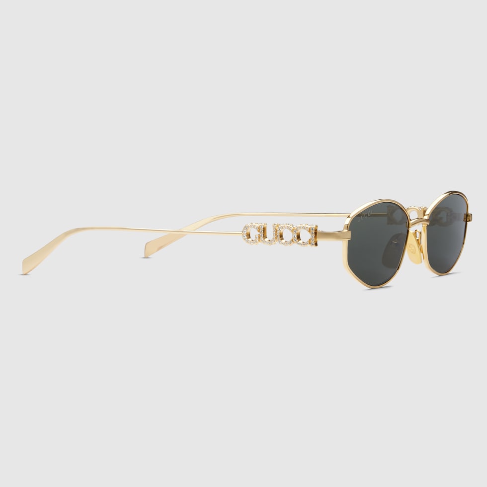 Oval frame sunglasses in yellow gold-toned | GUCCI® UK