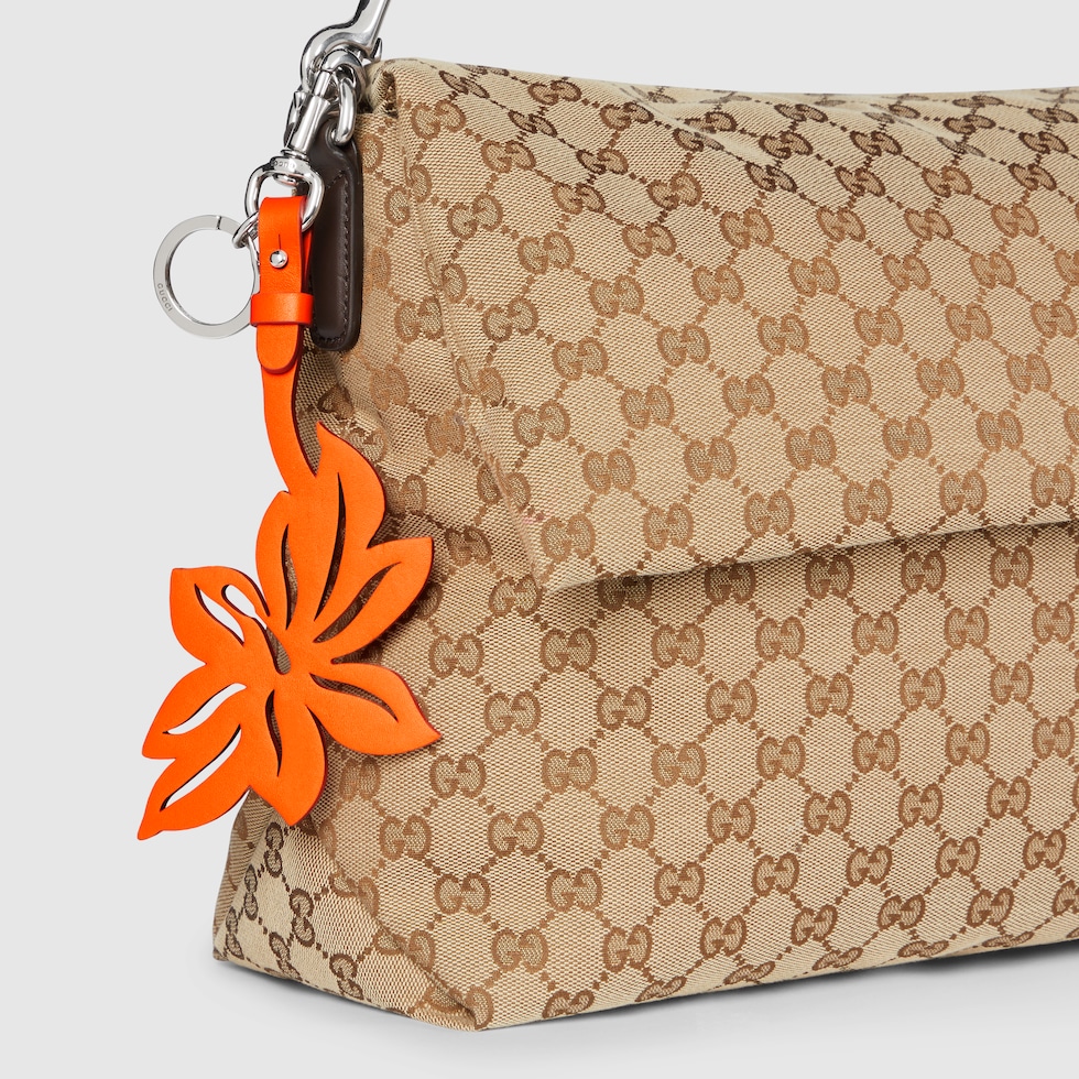 Flower keychain charm in bright orange leather | GUCCI® SG