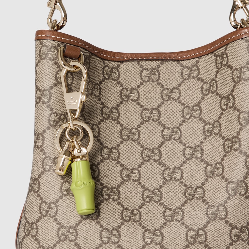 Keychain with bamboo details in bright green varnish | GUCCI® ZA