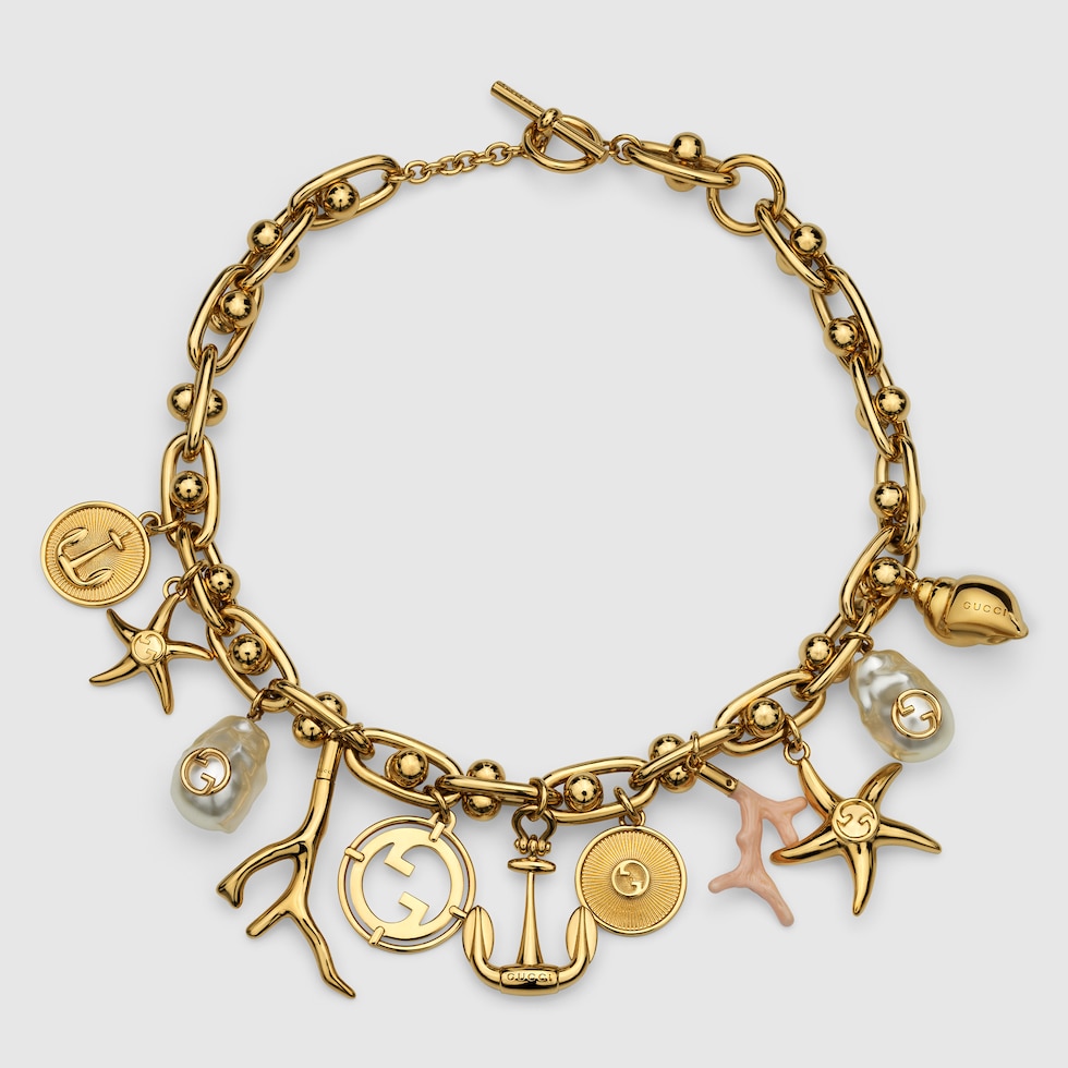 Chain necklace with Gucci symbols in yellow gold-toned brass | GUCCI® SG