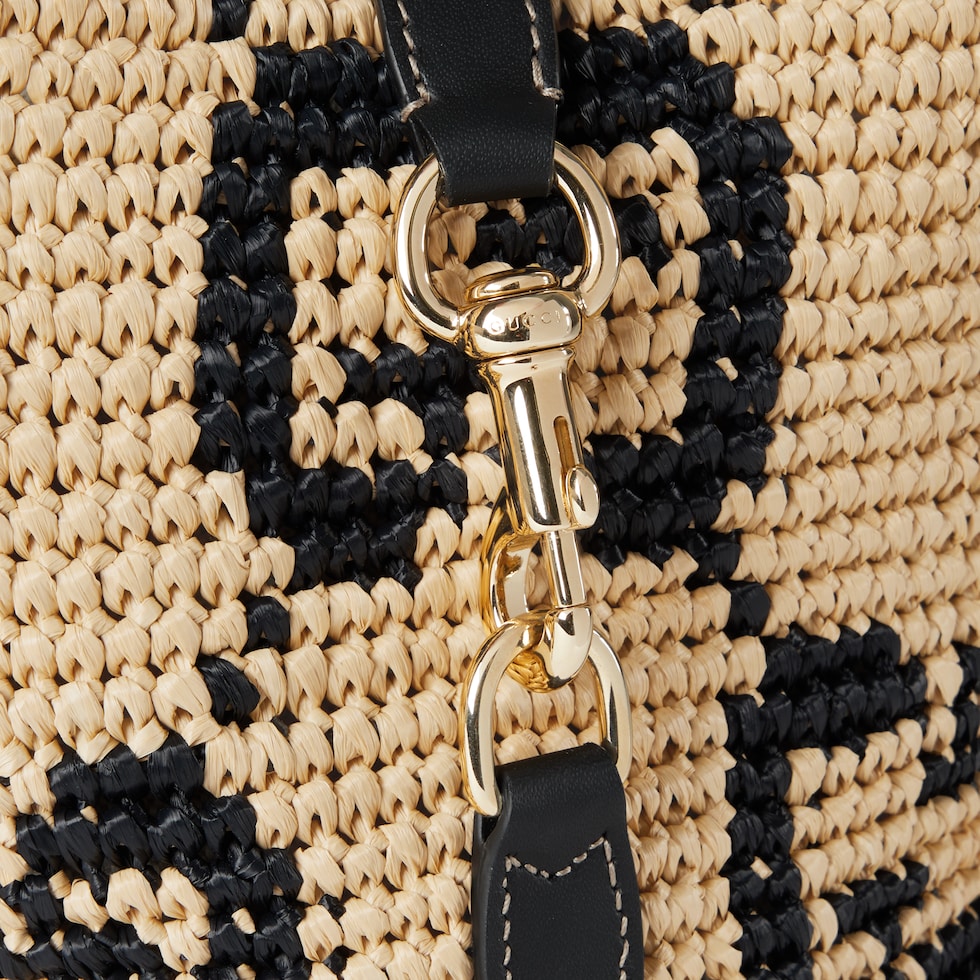 Raffia-effect mini bucket bag in natural and black fabric | GUCCI® AE