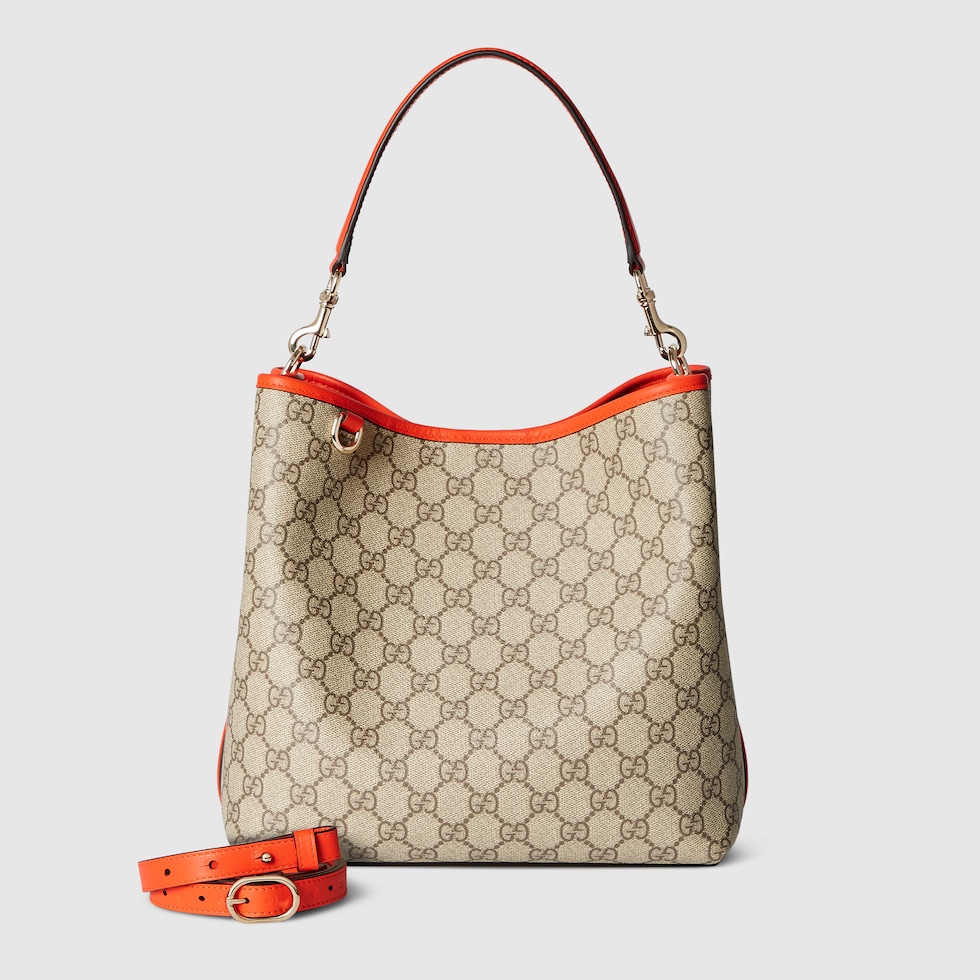GG Emblem medium bucket bag in beige and brown GG fabric | GUCCI® US