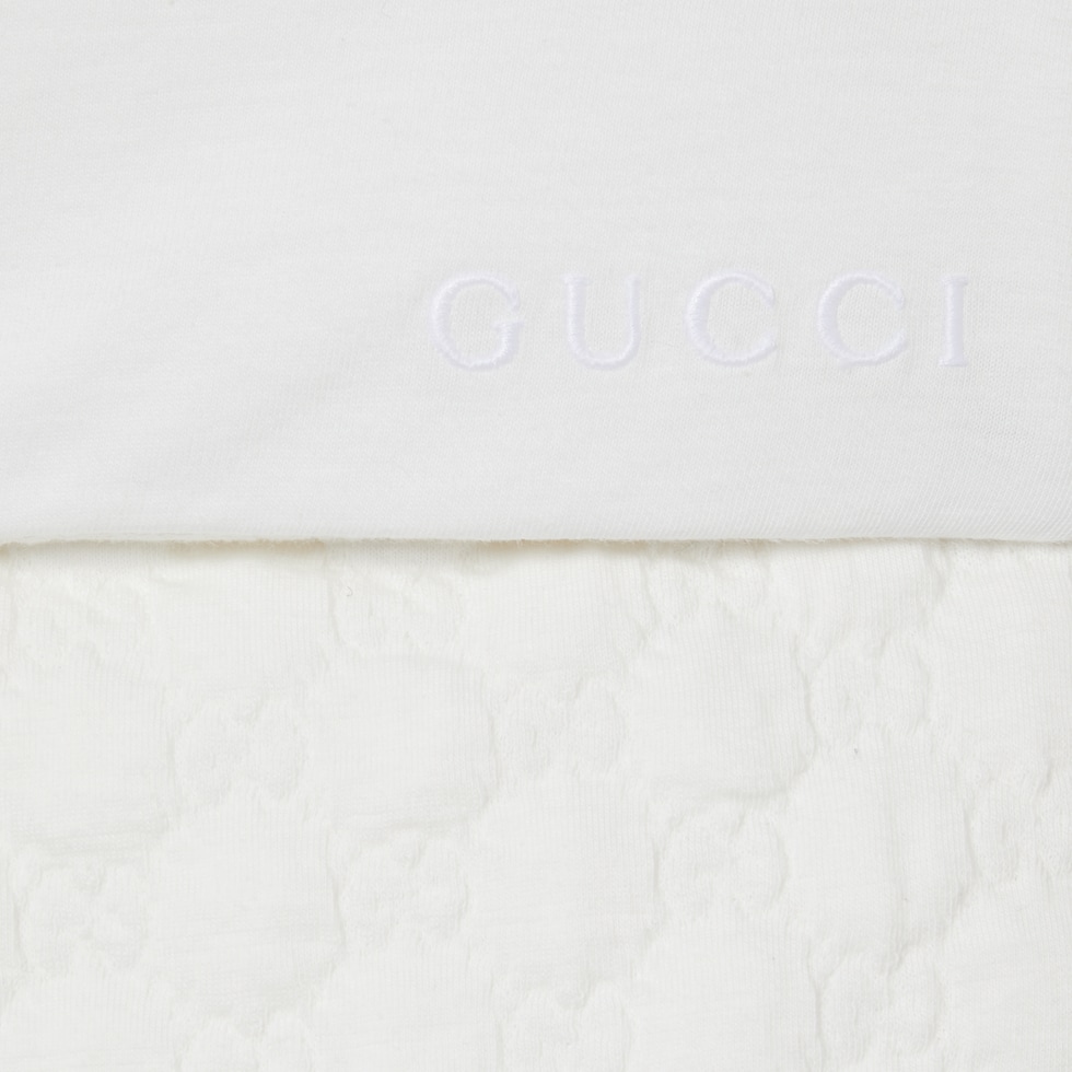 Baby padded GG jersey sleeping bag in white | GUCCI® UK