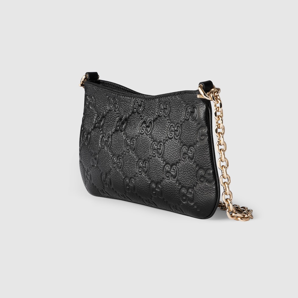 GG Emblem small shoulder bag in black leather | GUCCI® US