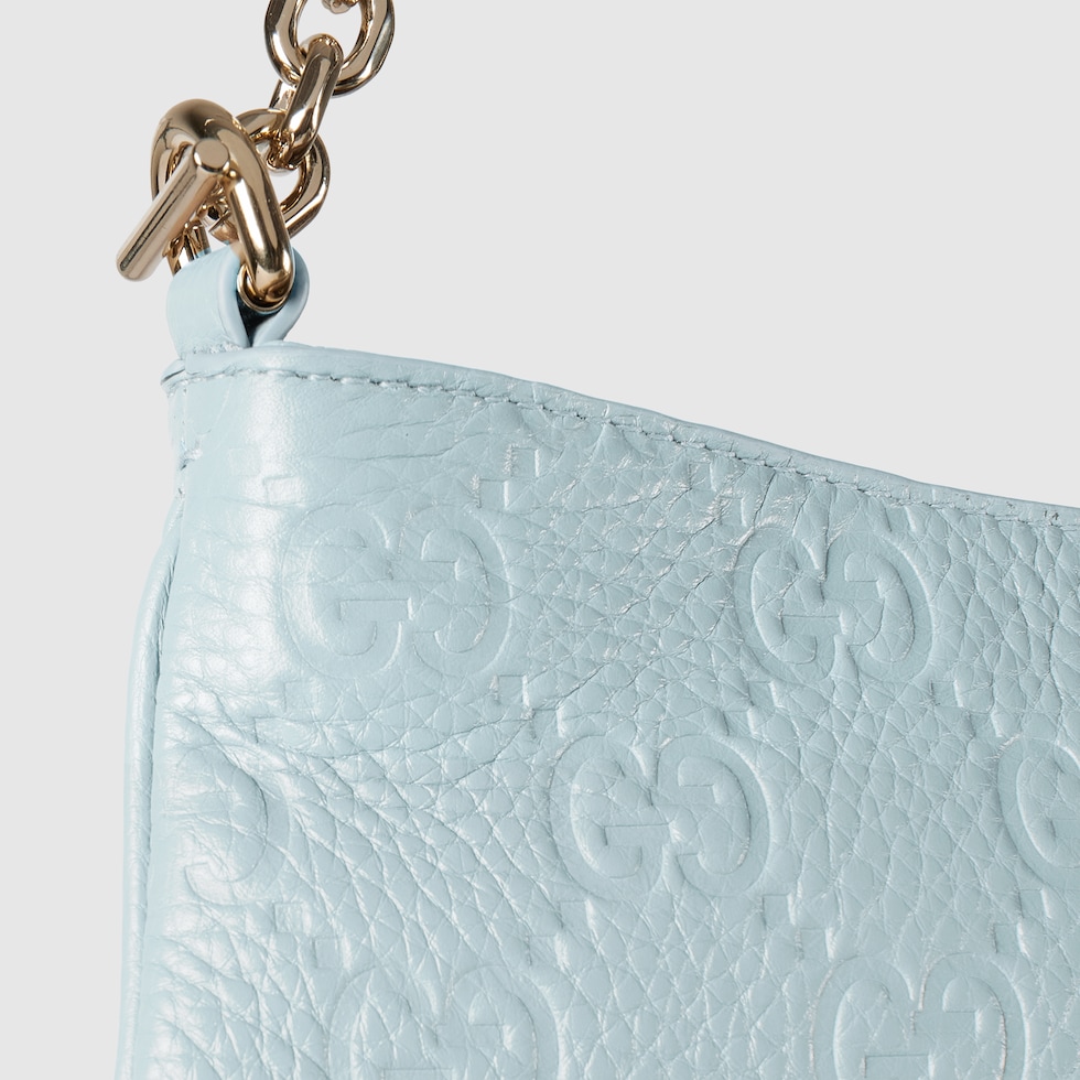 GG Emblem small shoulder bag in light blue leather | GUCCI® US