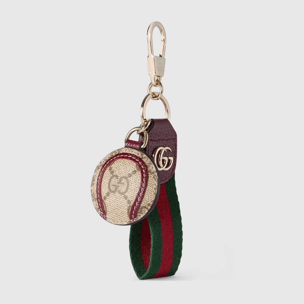 Gucci Tennis keychain with Web in beige and brown GG fabric | GUCCI® US