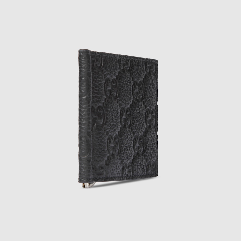 Gucci Imprint wallet with money clip in black GG leather | GUCCI® NL