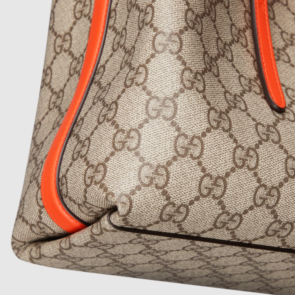 GG Emblem medium tote bag in beige and brown GG fabric | GUCCI® UK