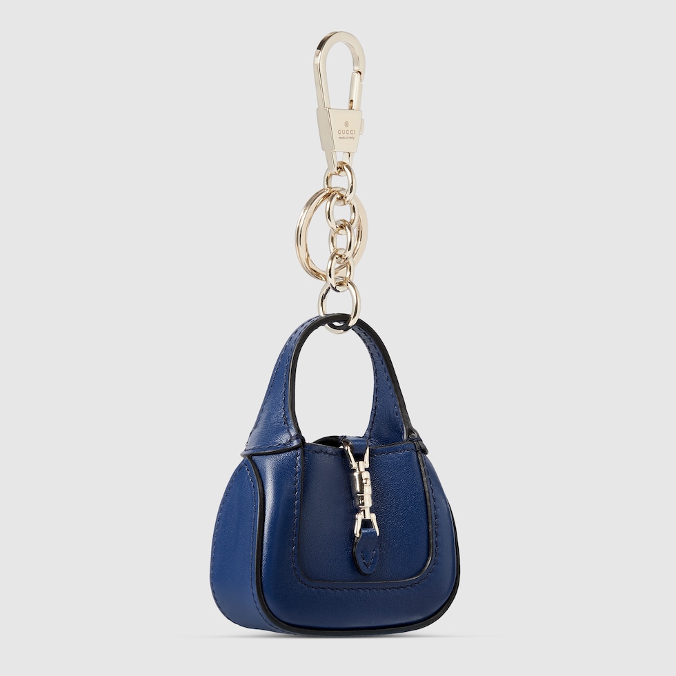 Keychain with Gucci Jackie 1961 in light gold-toned metal | GUCCI® PL