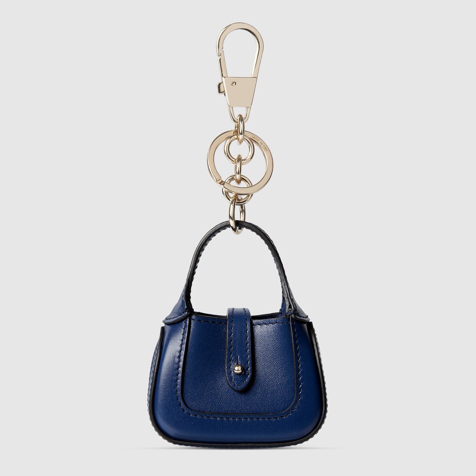 Keychain with Gucci Jackie 1961 in light gold-toned metal | GUCCI® PL