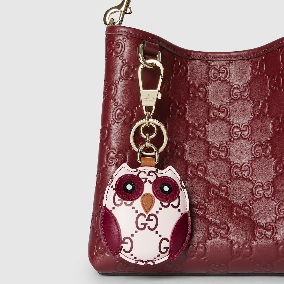 Owl-shaped bag charm in pink and red embossed GG leather | GUCCI® RO