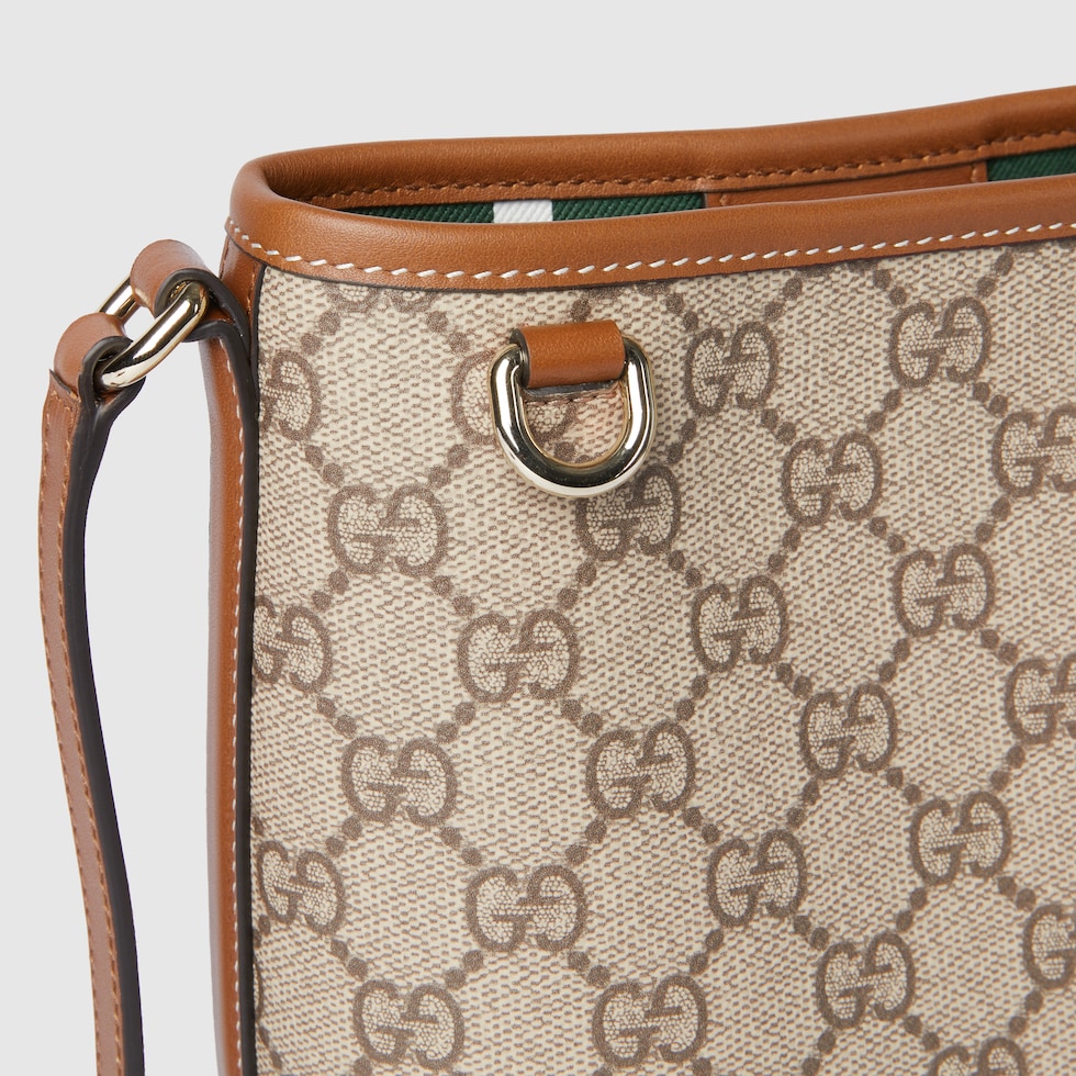 GG Emblem nano bucket bag in beige and dark brown fabric | GUCCI® US