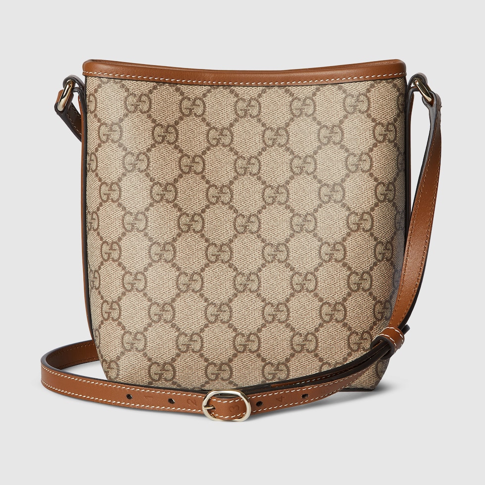 Nanobolso bombonera GG Emblem en tejido beige y marrón oscuro | GUCCI® ES