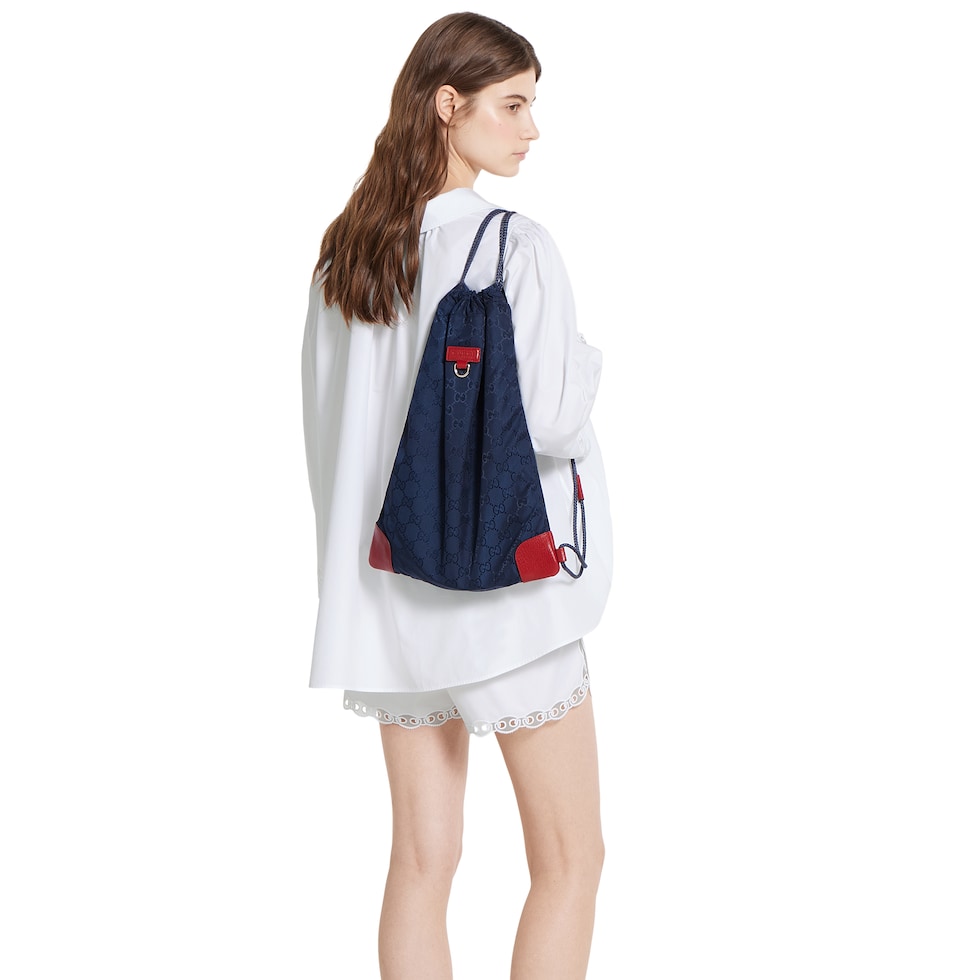 Wooden beach racket and ball set in blue and red | GUCCI® US