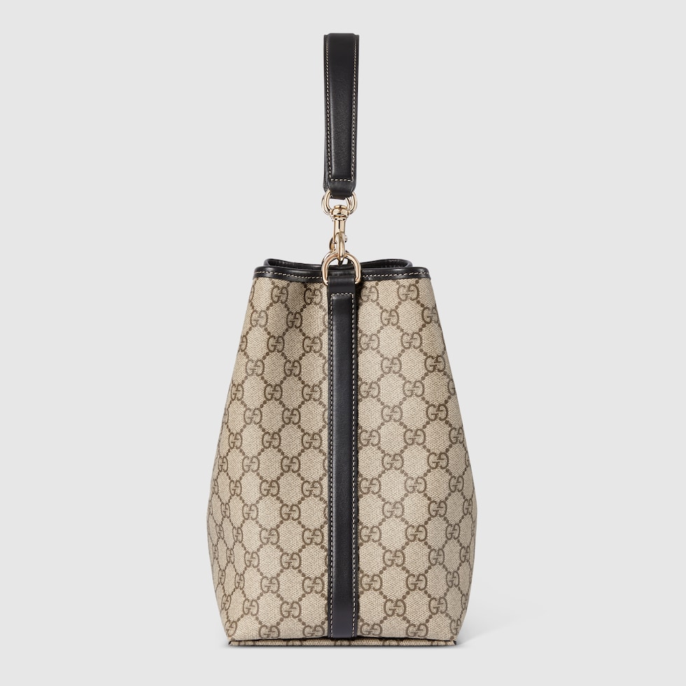 GG Emblem medium bucket bag in beige and brown GG fabric | GUCCI® US