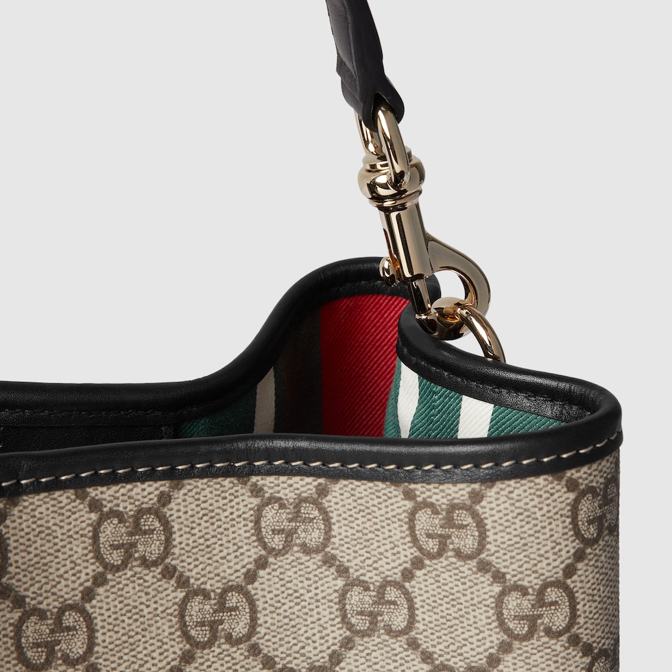 GG Emblem small bucket bag in beige and brown GG fabric | GUCCI® US