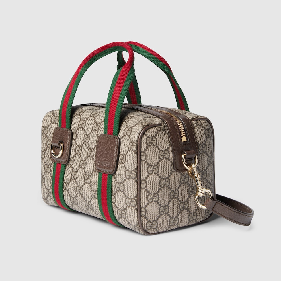 Gucci Mini GG duffle bag in beige and brown GG fabric | GUCCI® BE