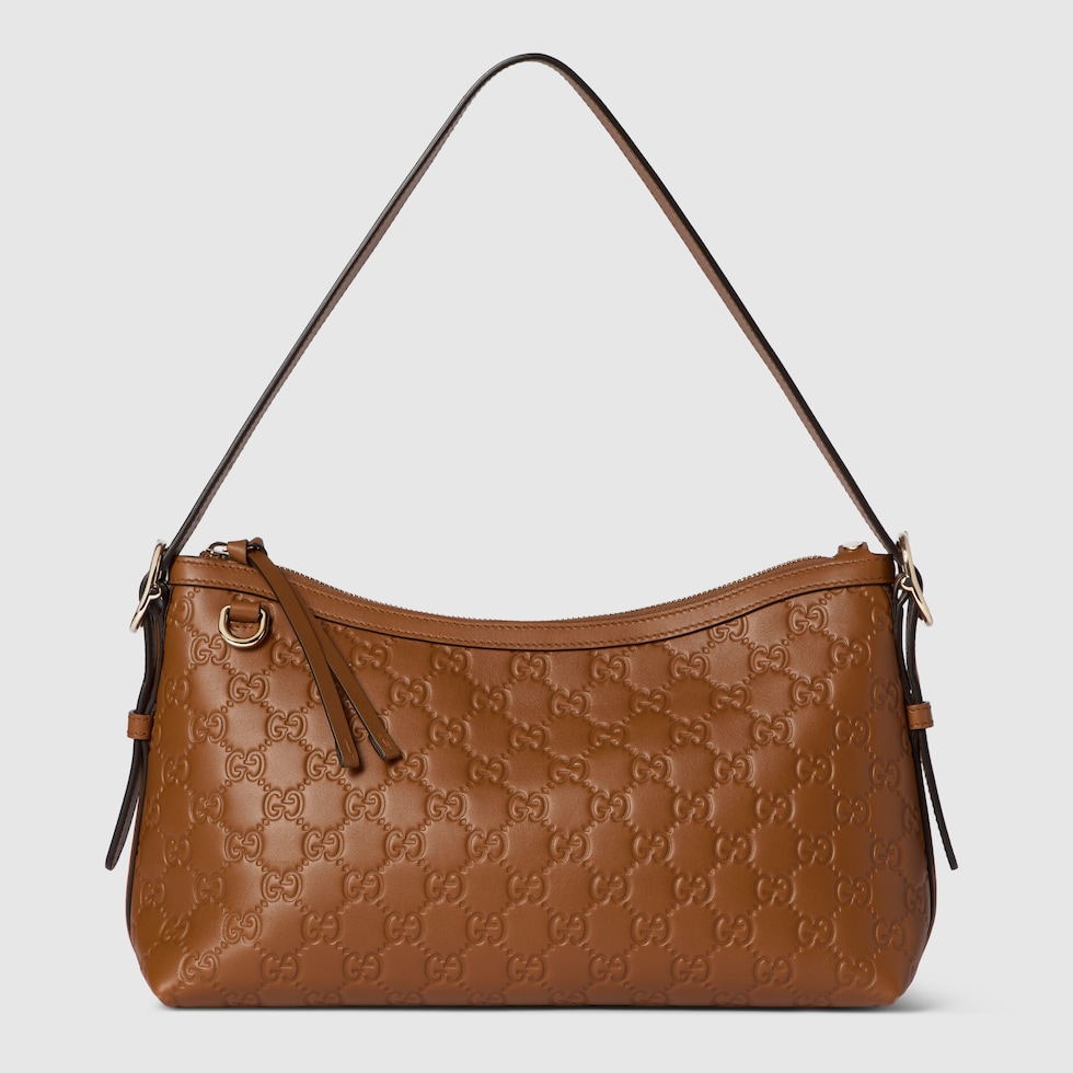 GG Emblem medium shoulder bag in brown GG leather | GUCCI® CH
