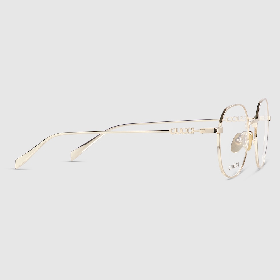 Round optical frame in light gold | GUCCI® UK